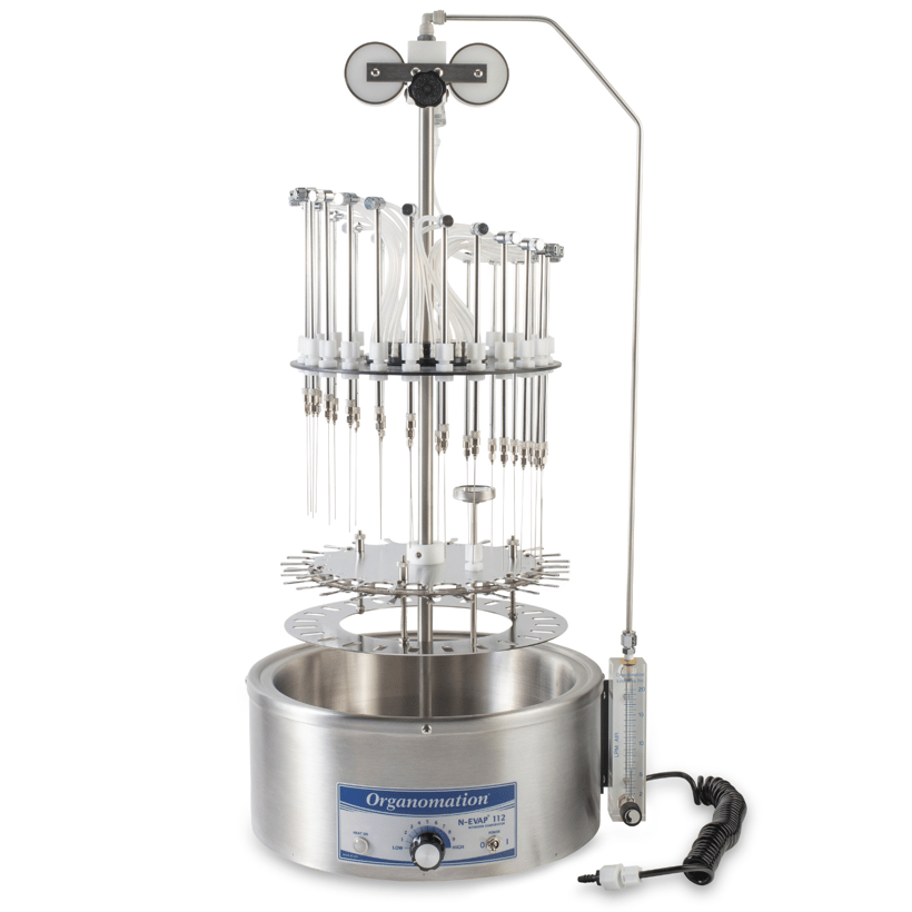 Applying nitrogen gas by hand, one test tube at a time